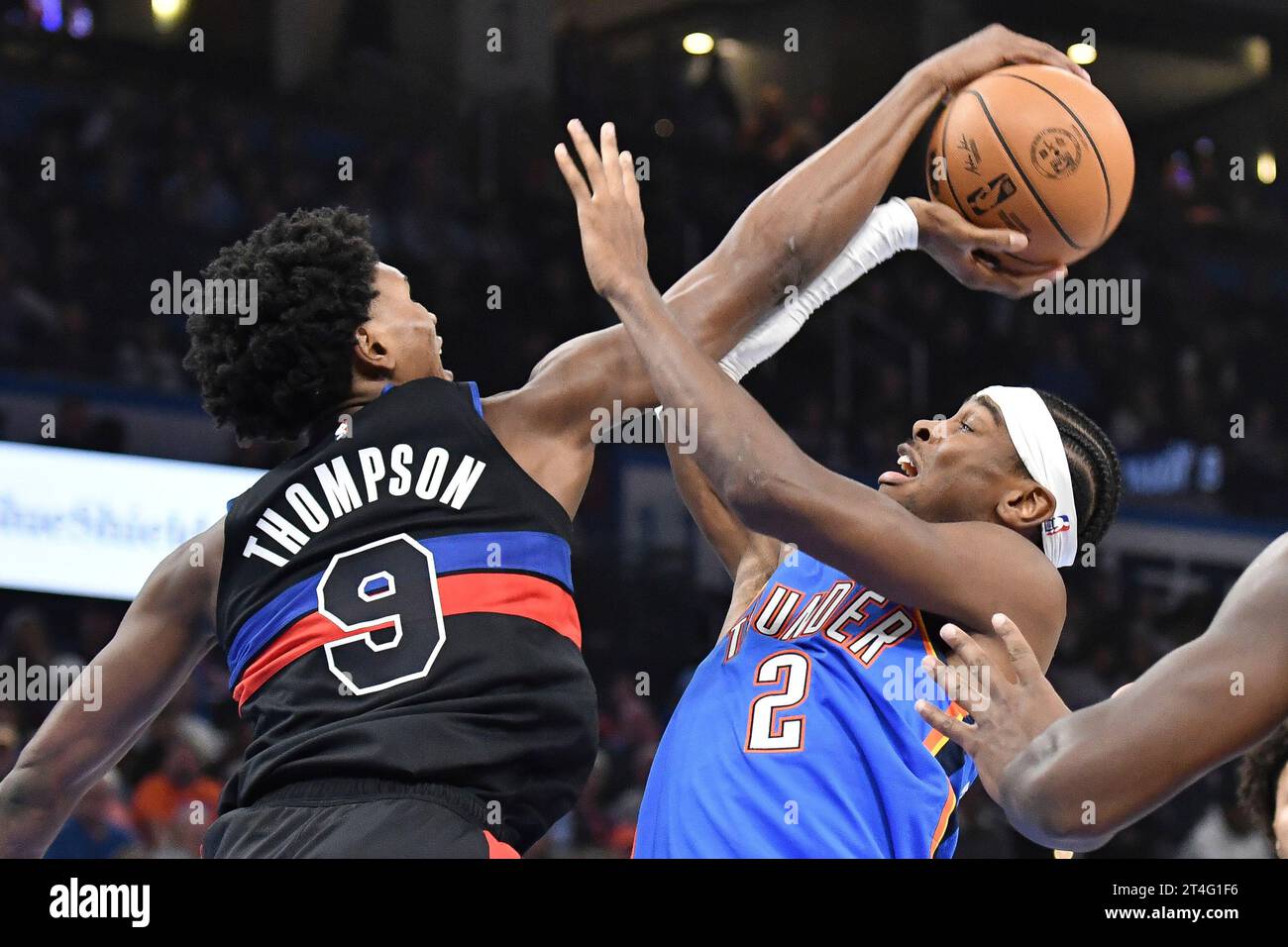 Oklahoma City Thunder guard Shai Gilgeous-Alexander (2) is blocked by ...