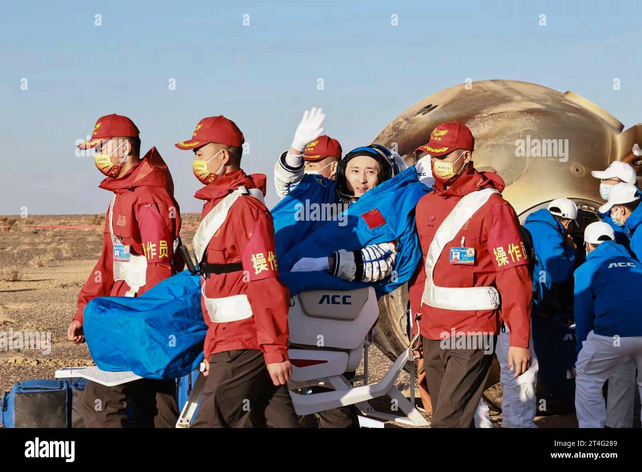 Dongfeng Landing Site. 31st Oct, 2023. Astronaut Zhu Yangzhu is out of the return capsule of the ...