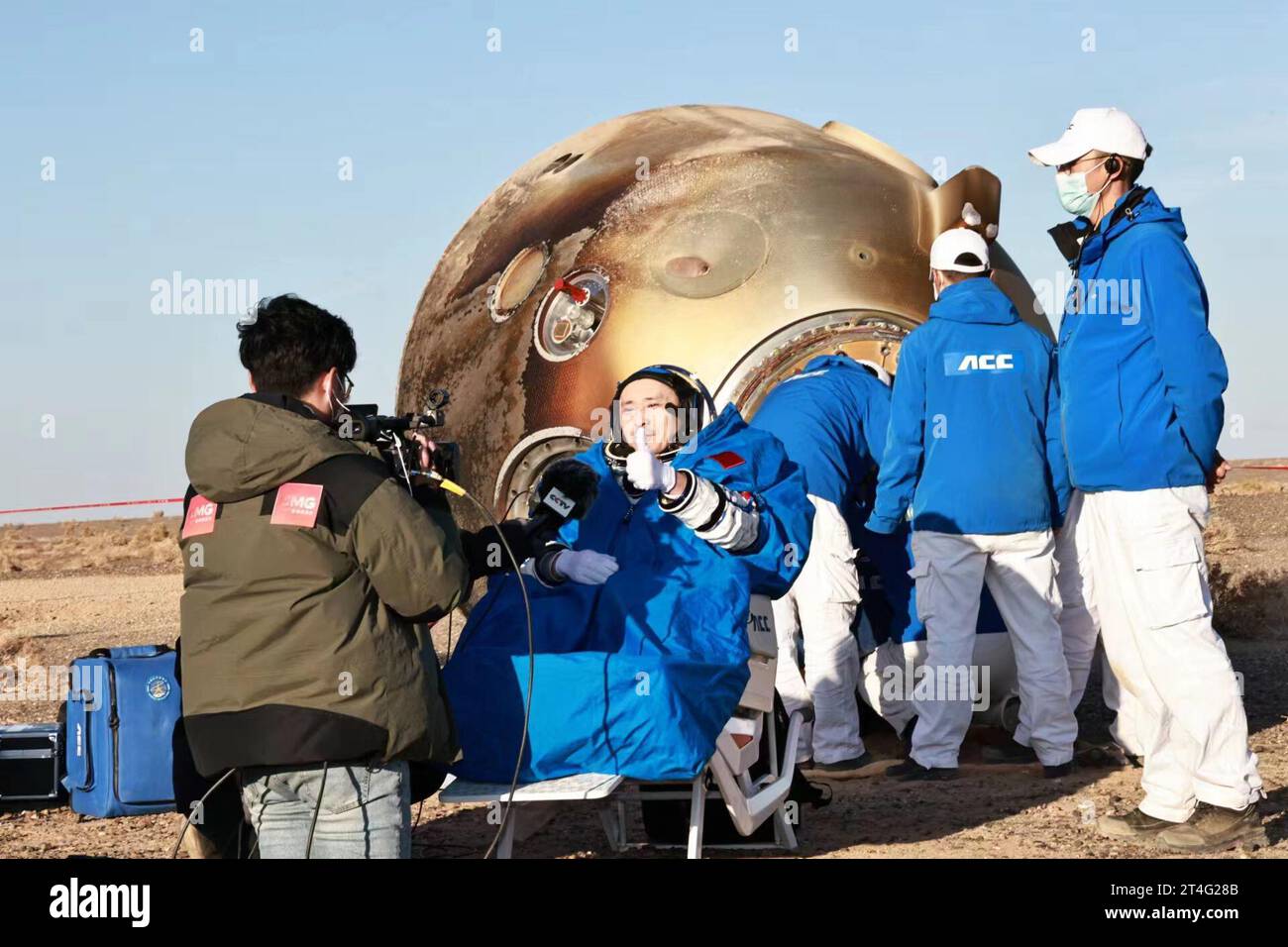 Dongfeng Landing Site. 31st Oct, 2023. Astronaut Zhu Yangzhu is out of the return capsule of the ...