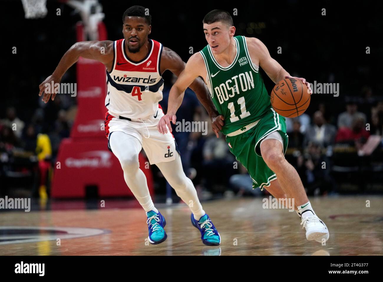 Boston Celtics guard Payton Pritchard (11) drives past Washington ...