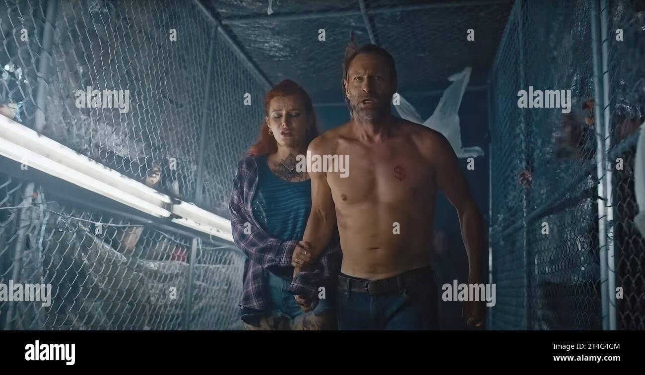 RUMBLE THROUGH THE DARK, from left: Bella Thorne, Aaron Eckhart, 2023. © Lionsgate Home ...