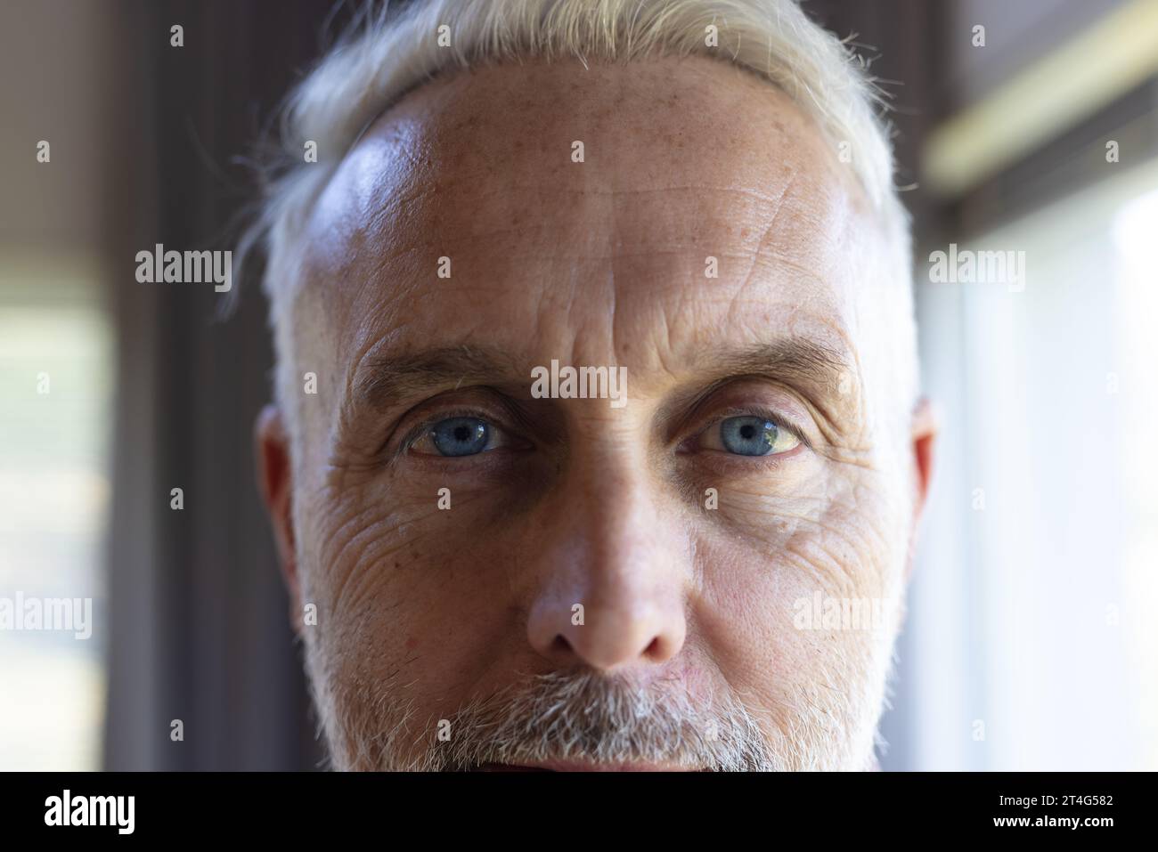 Portrait happy man smiling home hi-res stock photography and images - Alamy