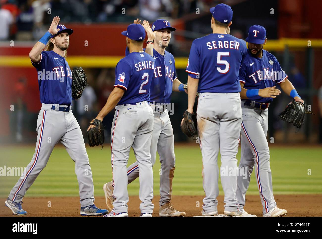 Phoenix, United States. 30th Oct, 2023. Texas Rangers players celebrate ...
