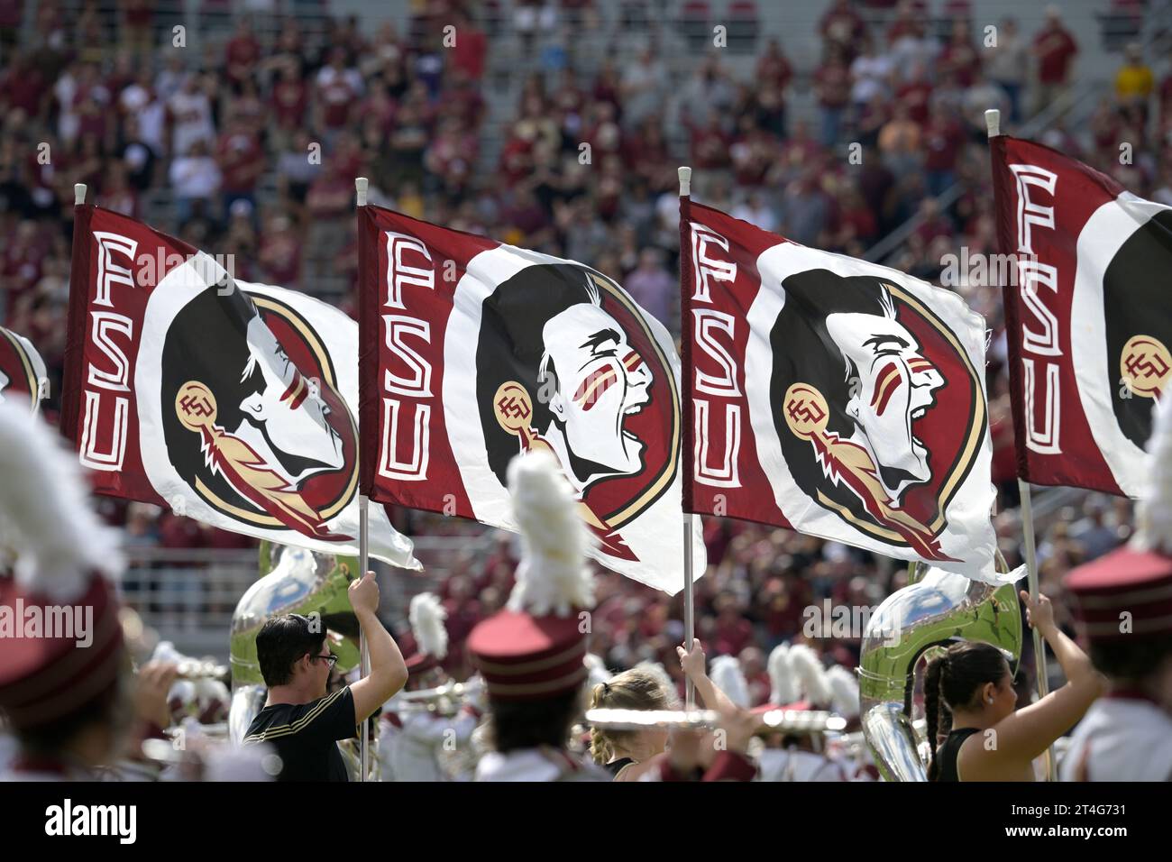 Members of the Florida State marching band perform on the field before ...