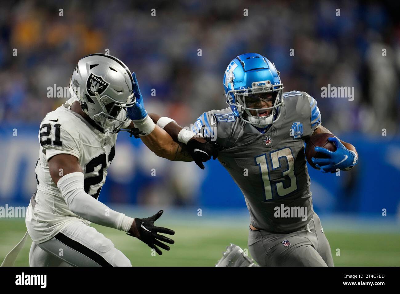 Detroit Lions running back Craig Reynolds (13) stiff arms Las Vegas ...