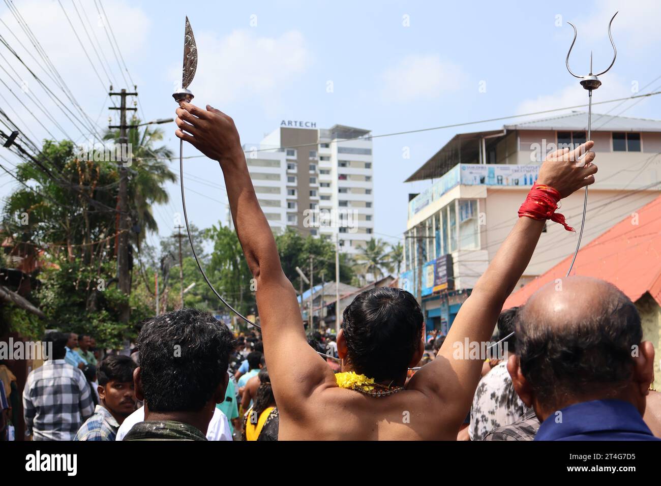 Shoola kaavadi during Navaratri festival in Poojappura Stock Photo - Alamy