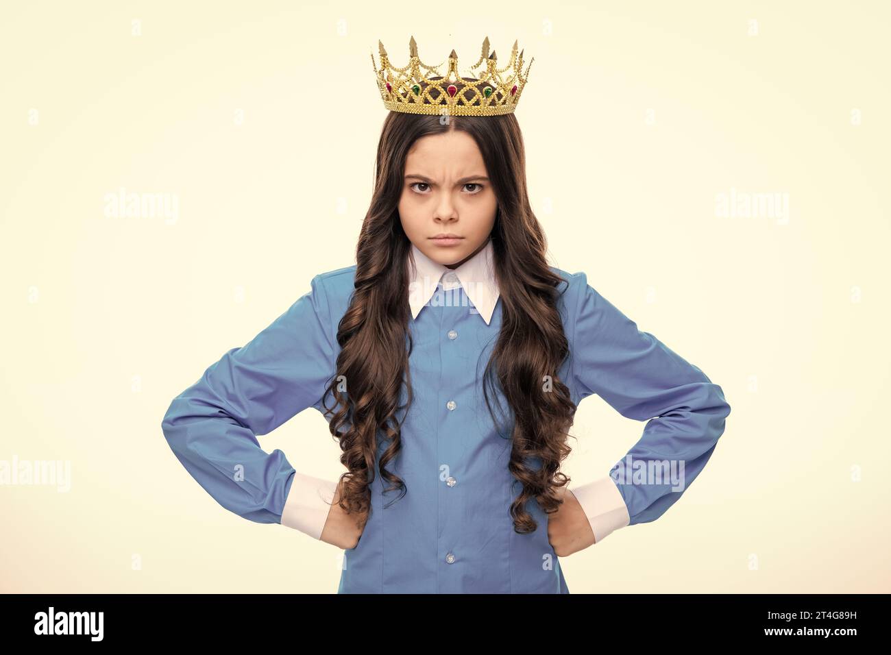 Little queen wearing golden crown. Teenage girl princess holding crown ...