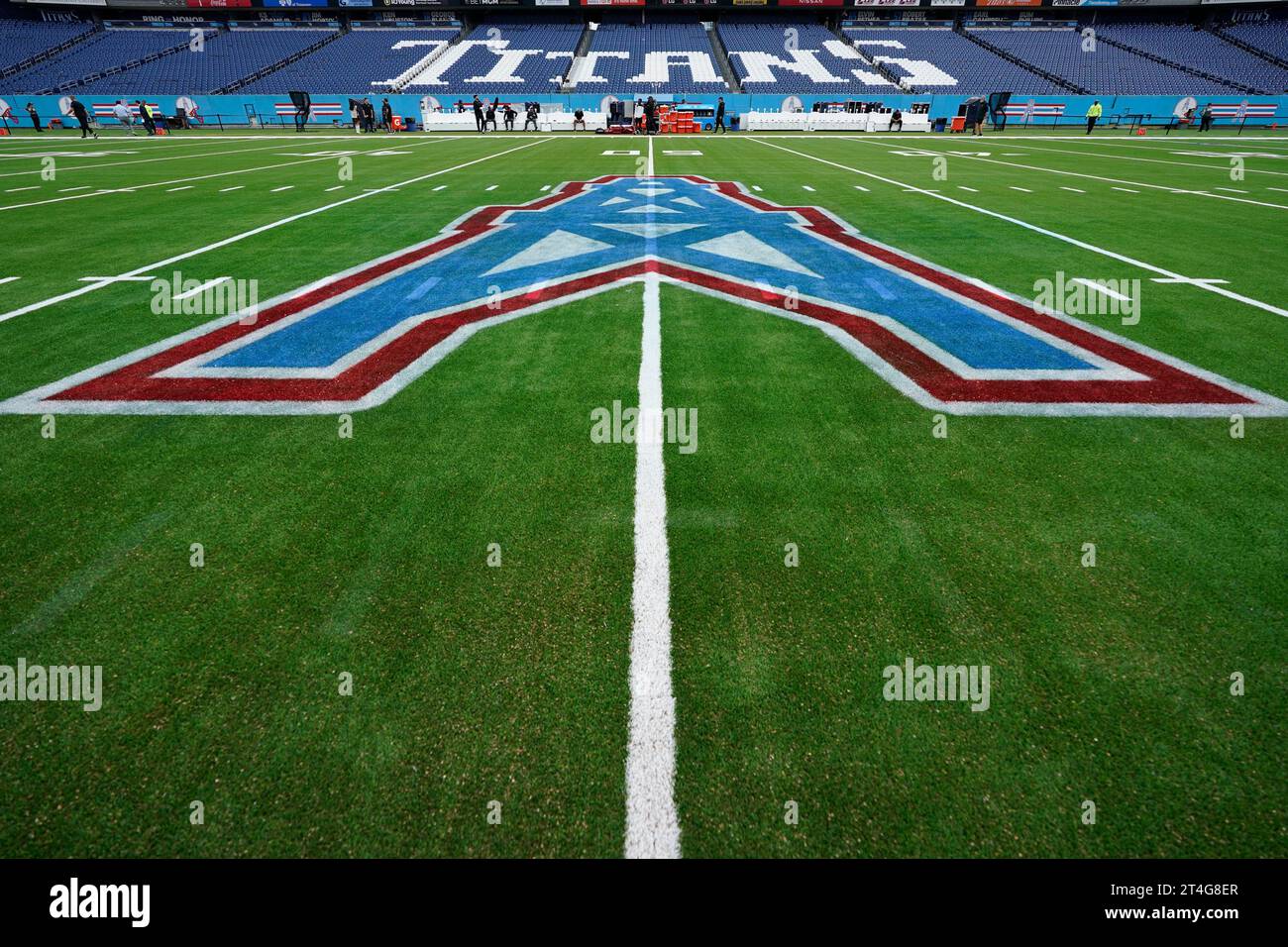 The Oilers logo is seen on the field before an NFL football game ...