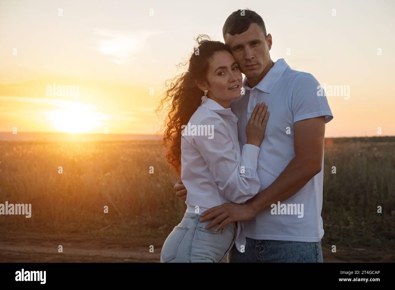 Harmony and devotion in relationship of loving couple at sunset Stock ...