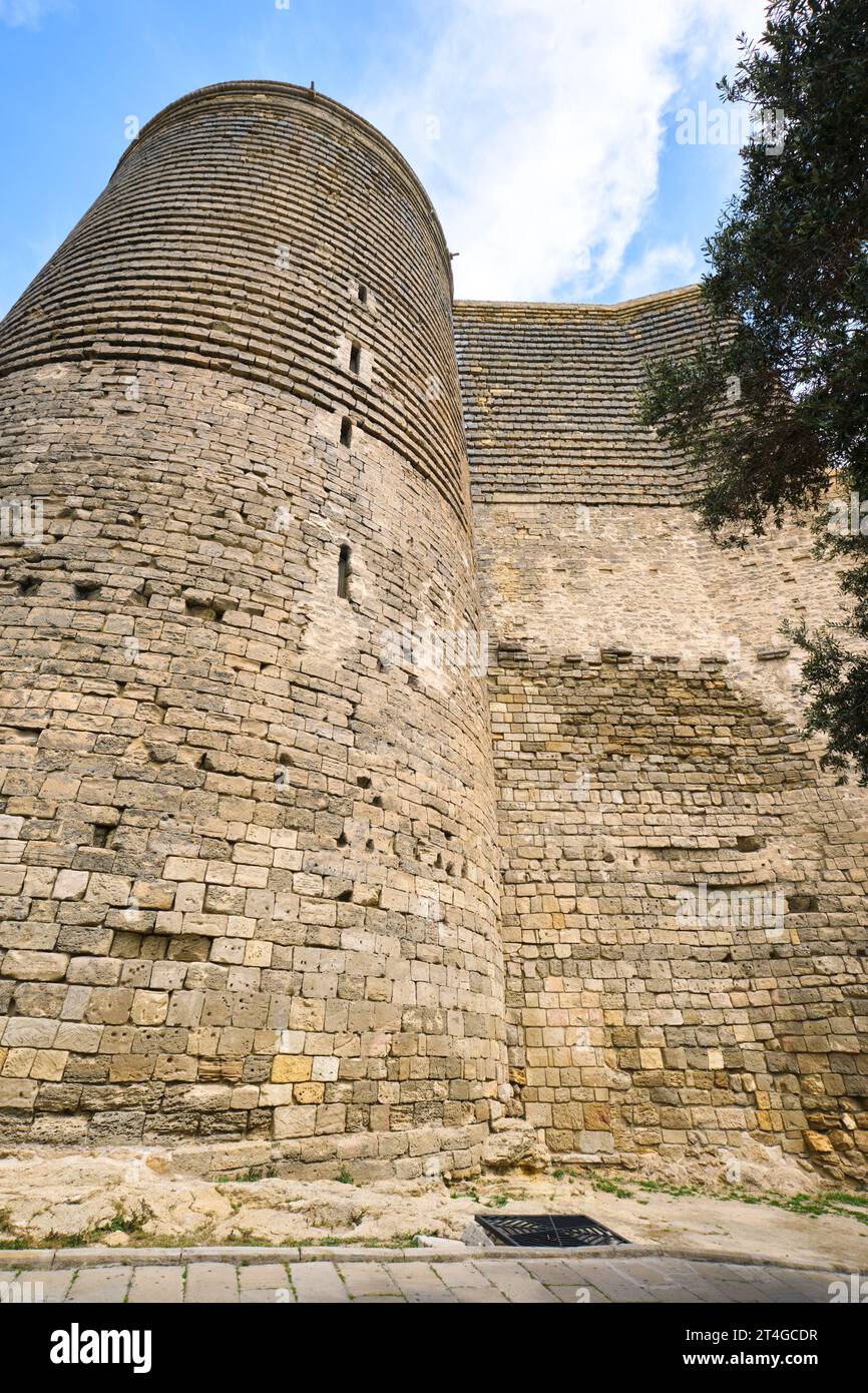 A view of the tall, round, circular, stone Maiden Tower, Qız Qalası ...