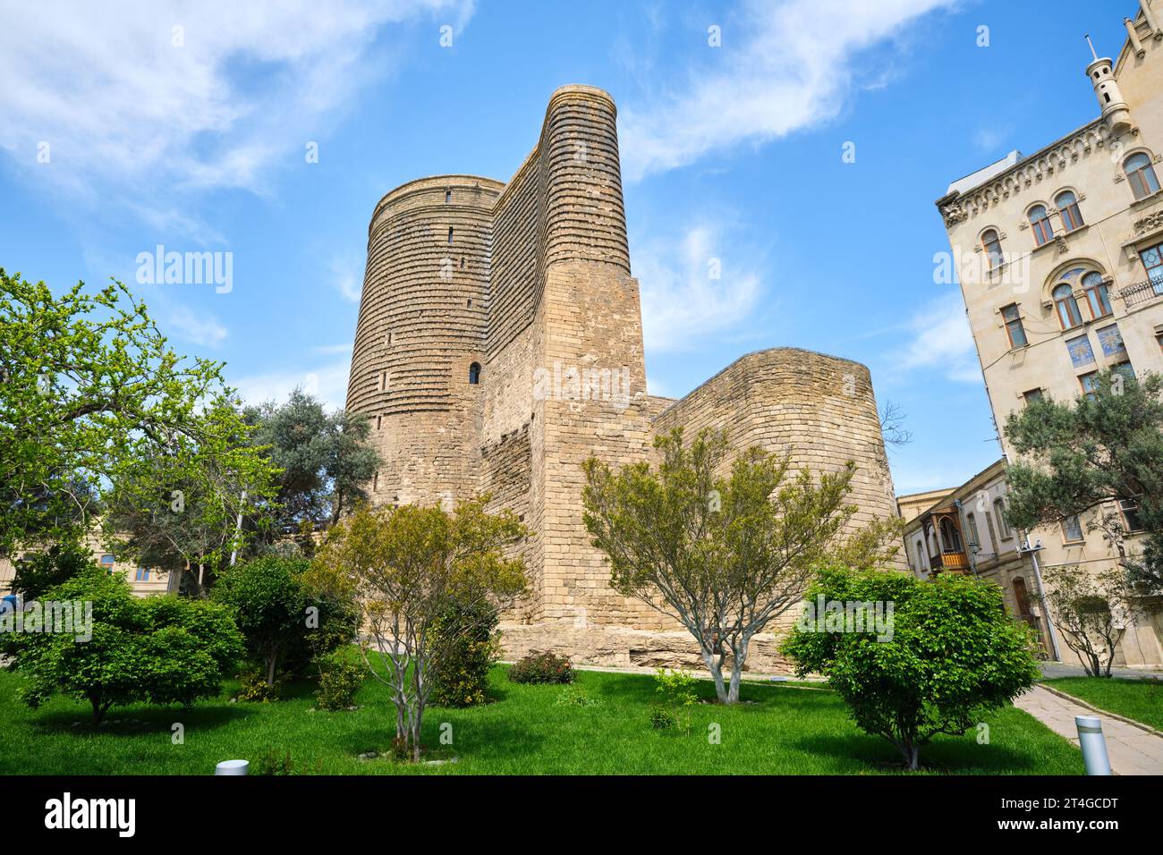 A view of the tall, round, circular, stone Maiden Tower, Qız Qalası ...