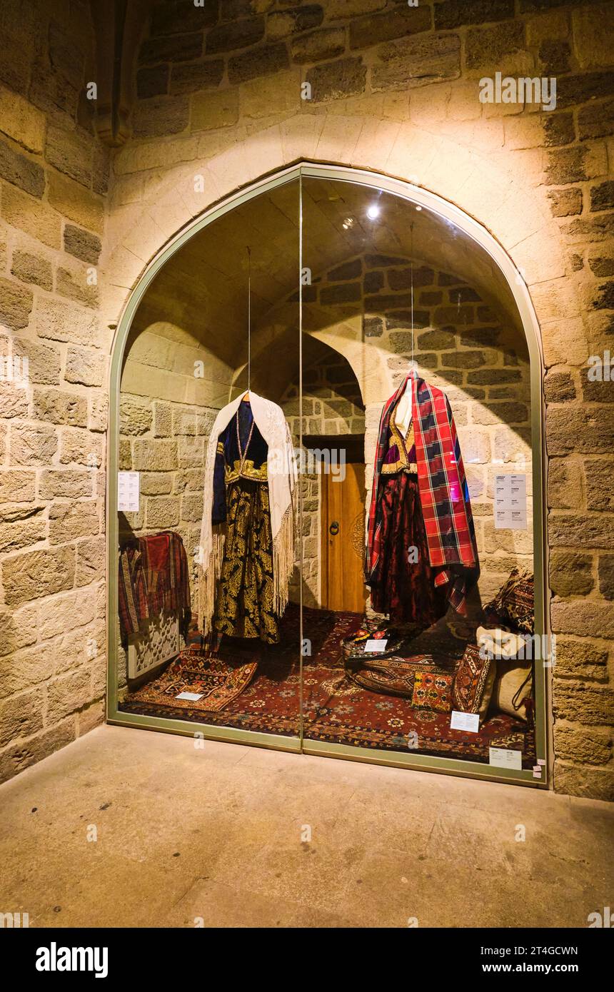 An exhibit of old, fancy, textile, wardrobe, clothes in the palace ...