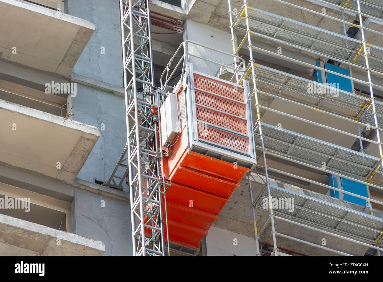 Electric elevator for construction site installed outside the facade of ...