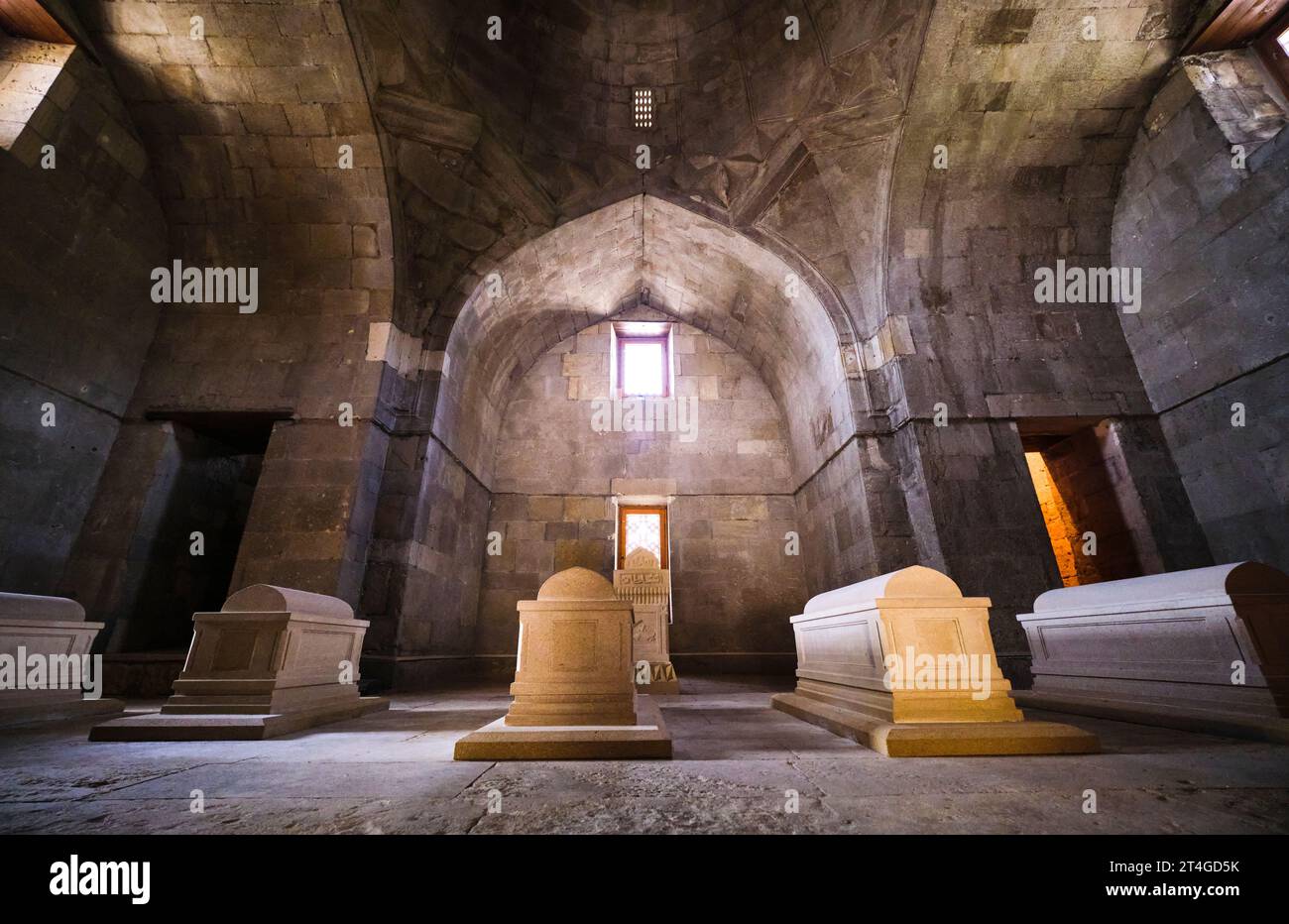 Interior view of the iconic Shirvanshah tomb with various stone grave ...