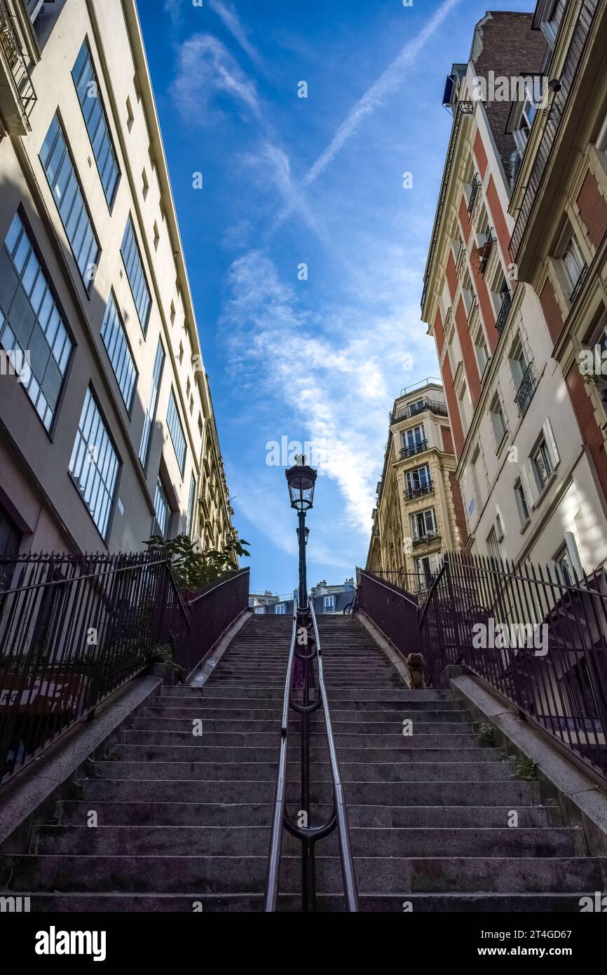Paris, romantic staircase in Montmartre, typical buildings and floor ...