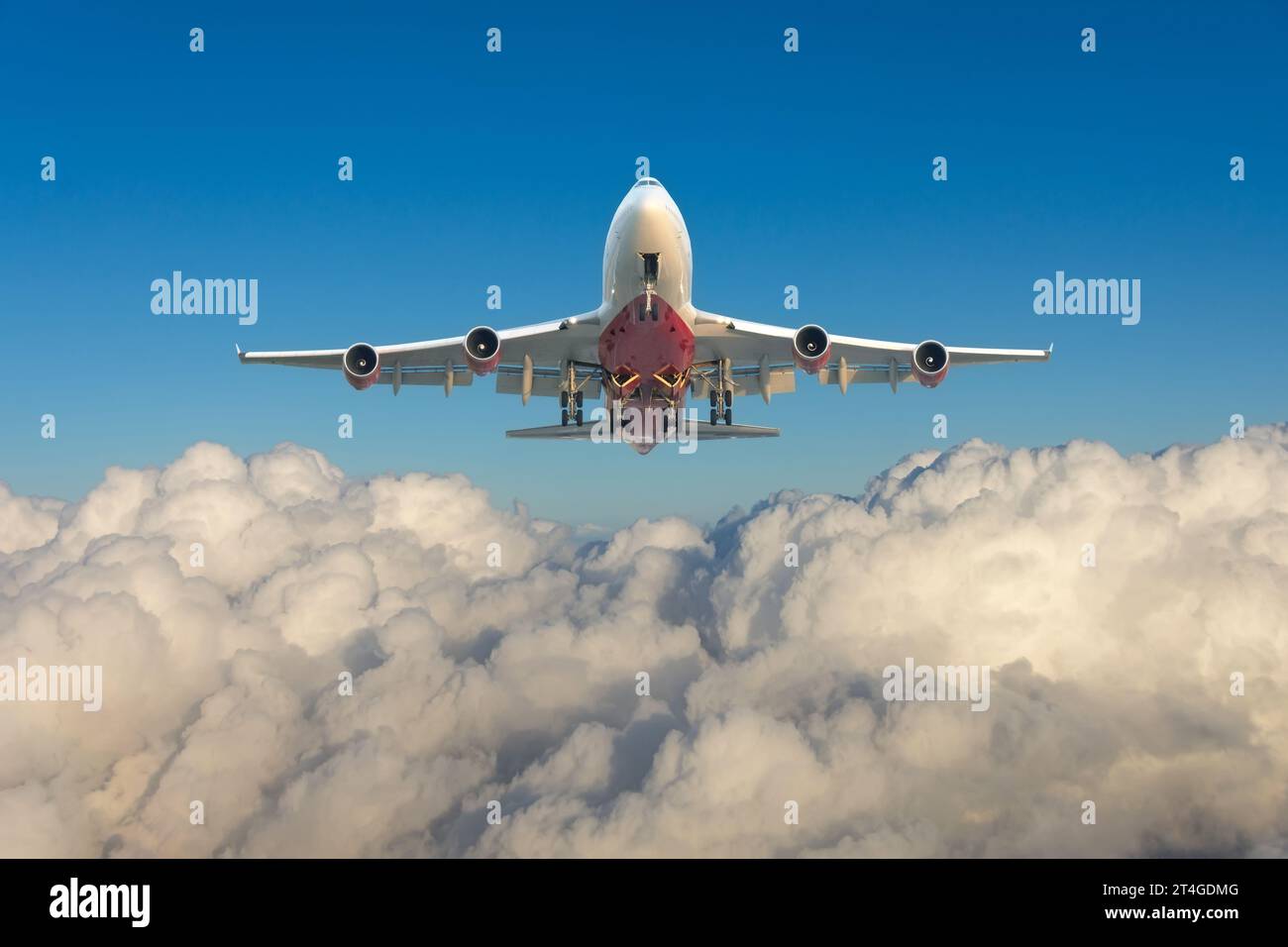 Beautiful Panoramic background clouds cumulus with flying plane in blue sky. Passenger airplane ...