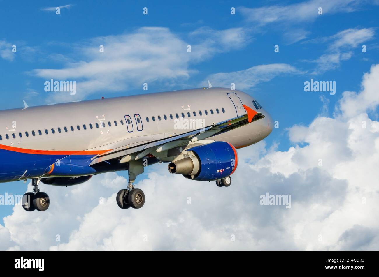 Airliner jet plane take off in the air on cloudscape background Stock ...