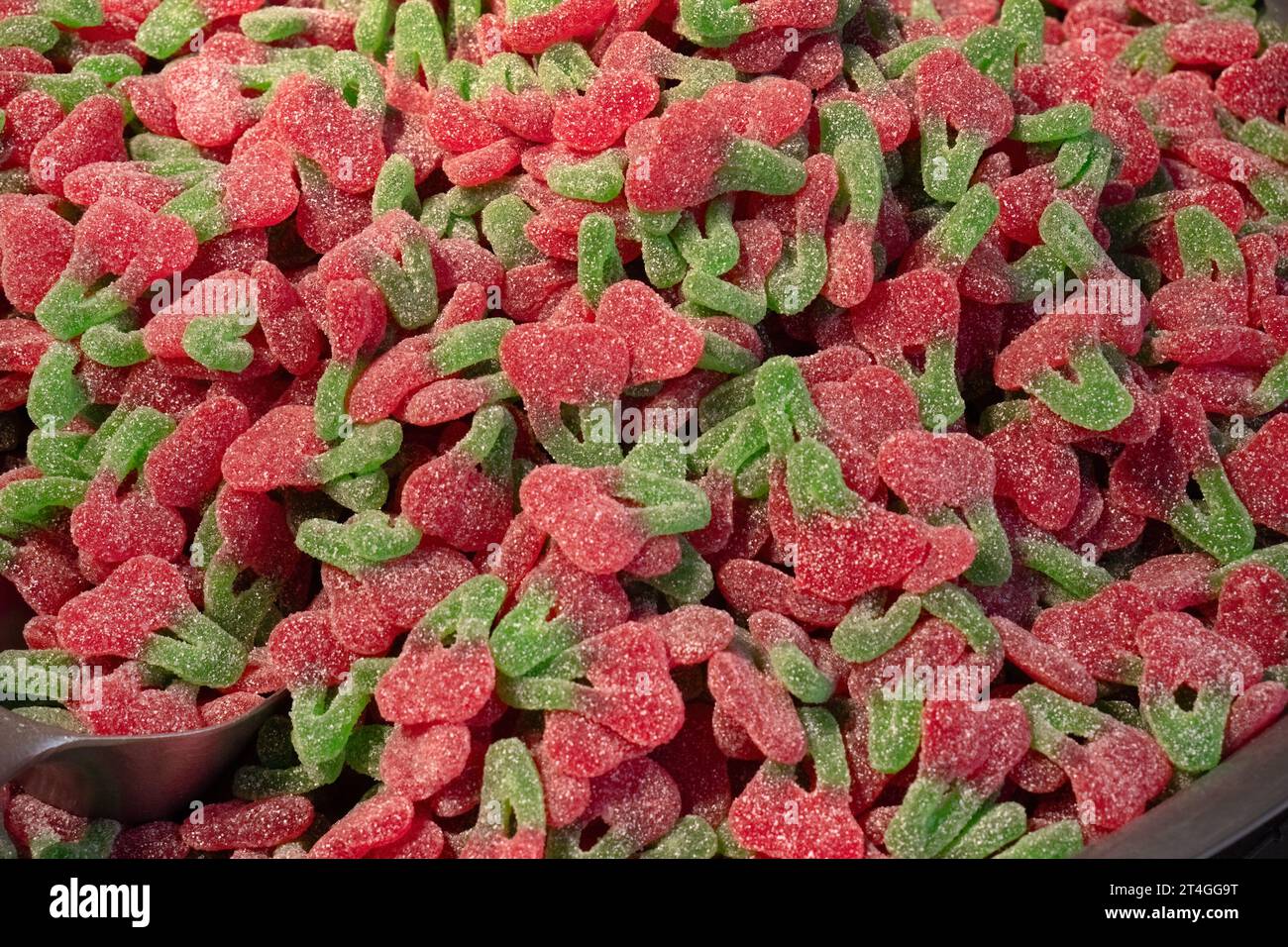 Closeup of mixture of red and green sugar coated jelly sweets at a food ...