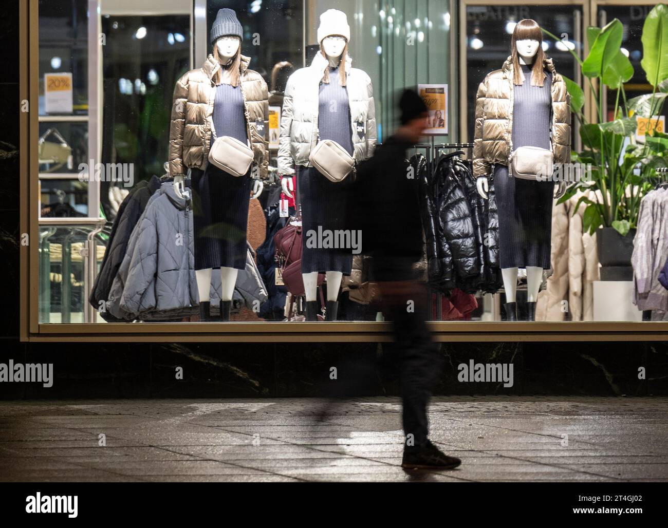 Berlin, Germany. 31st Oct, 2023. A passerby walks along in front of a ...