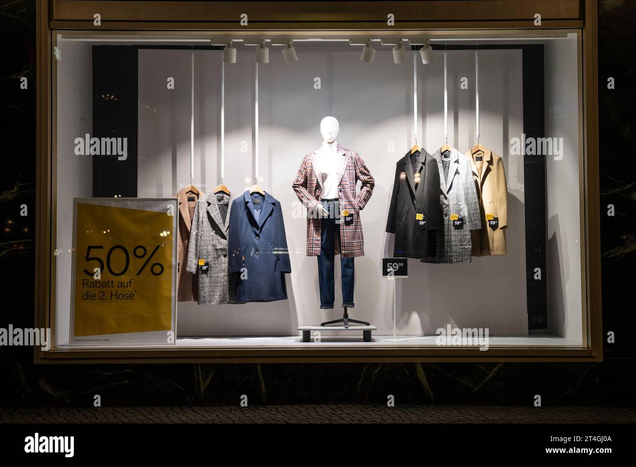 Berlin, Germany. 31st Oct, 2023. A discount sign stands in the window ...