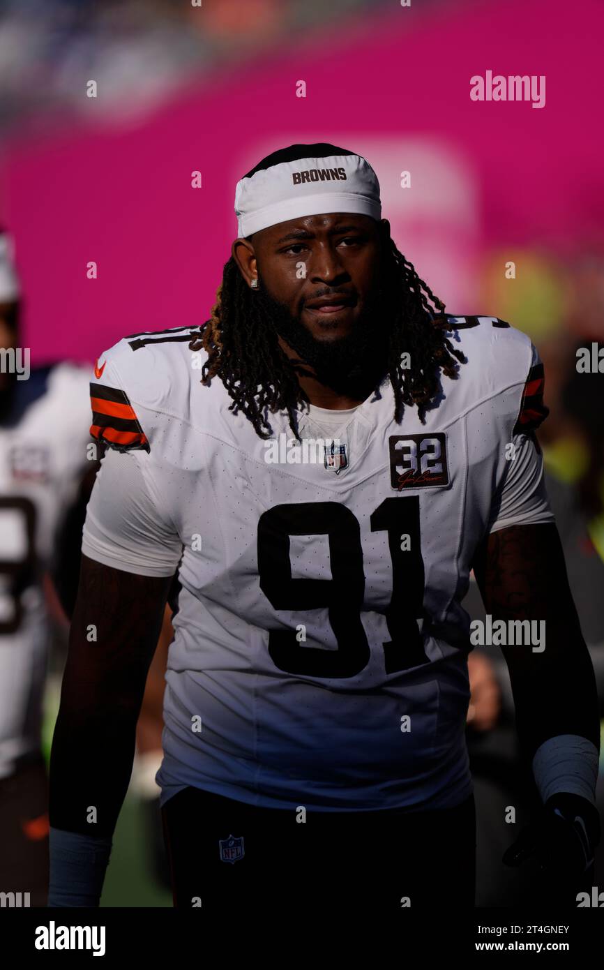 Cleveland Browns defensive end Alex Wright (91) walks off the field ...