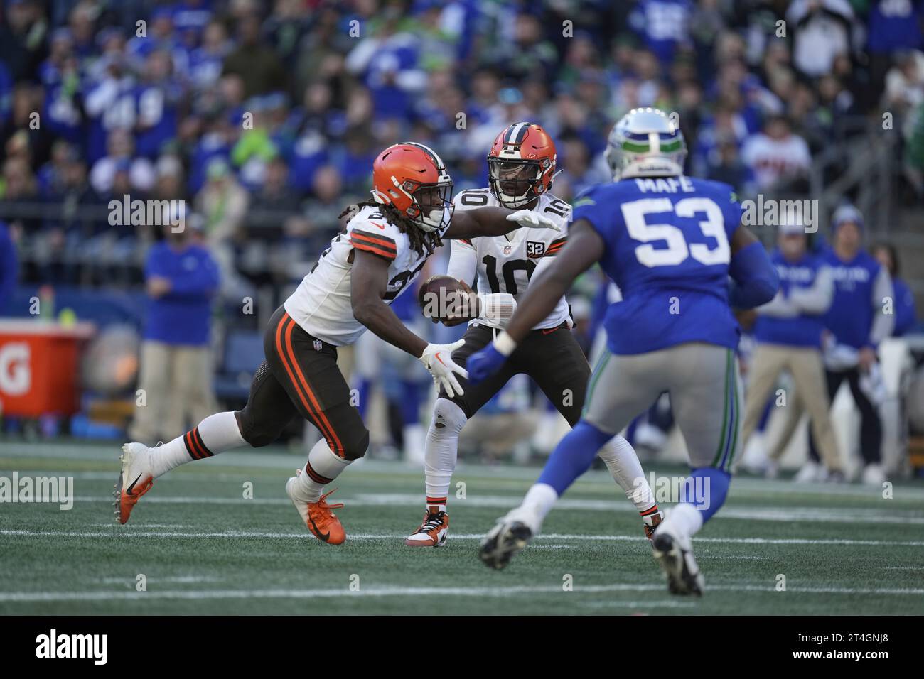 Cleveland Browns quarterback PJ Walker (10) hands off the ball to ...