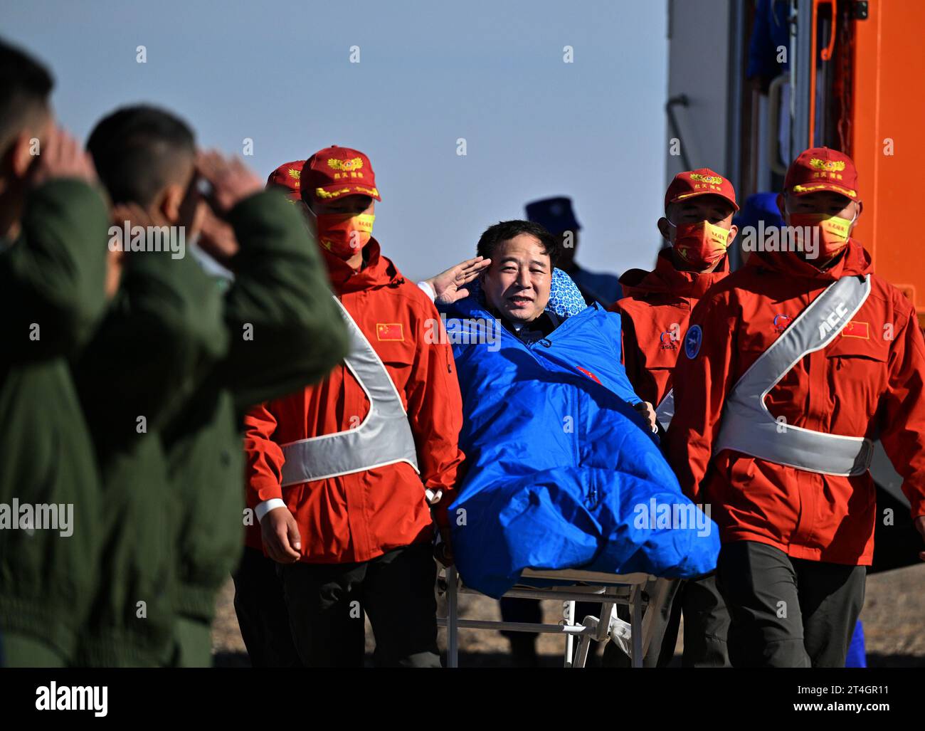 Dongfeng Landing Site. 31st Oct, 2023. Astronaut Jing Haipeng is out of the return capsule of ...