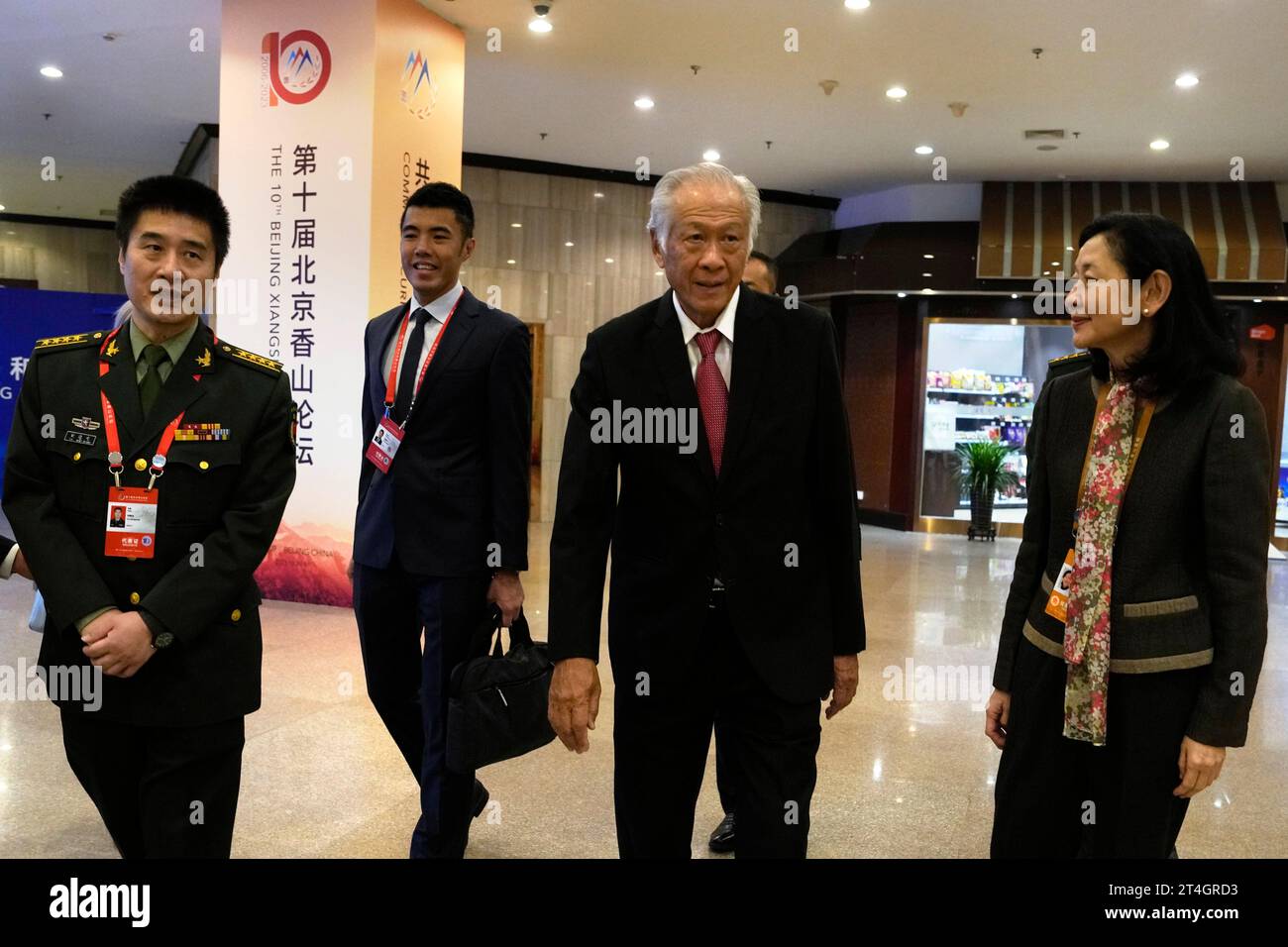 Singapore's Defense Minister Ng Eng Hen, center, arrives for the 10th ...