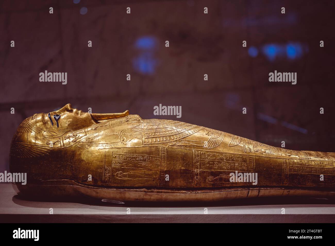 An ornate golden mummy displayed in an exhibit at the Egyptian Museum ...