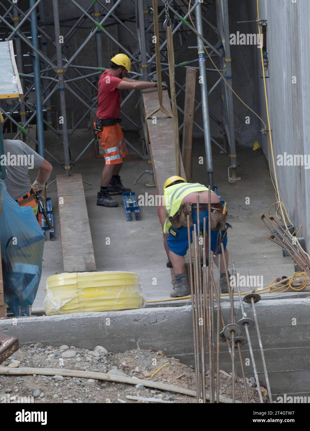 Construction Worker At A Building Site, Employee In Construction ...