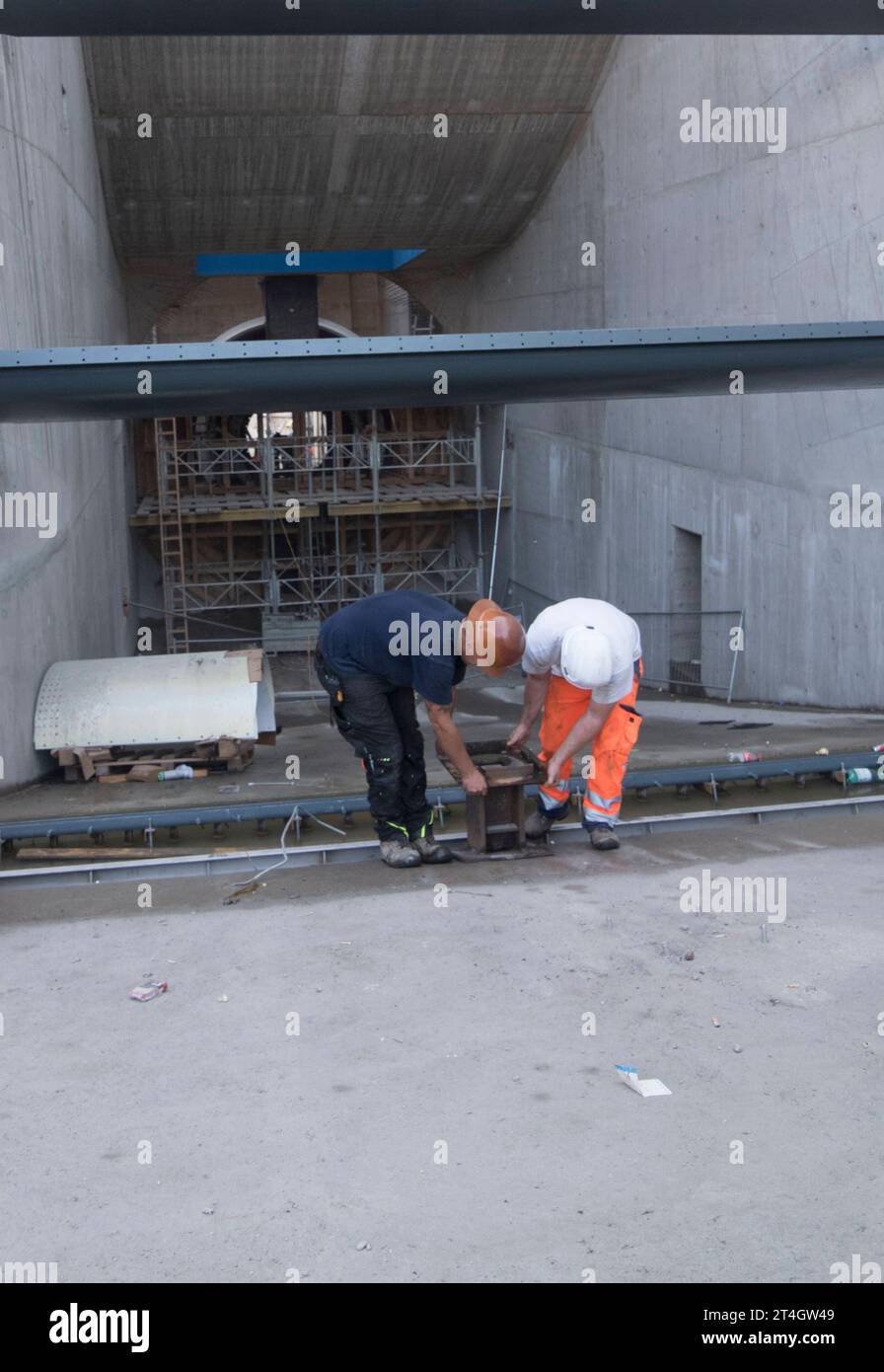 construction worker at a building site, employee in construction ...