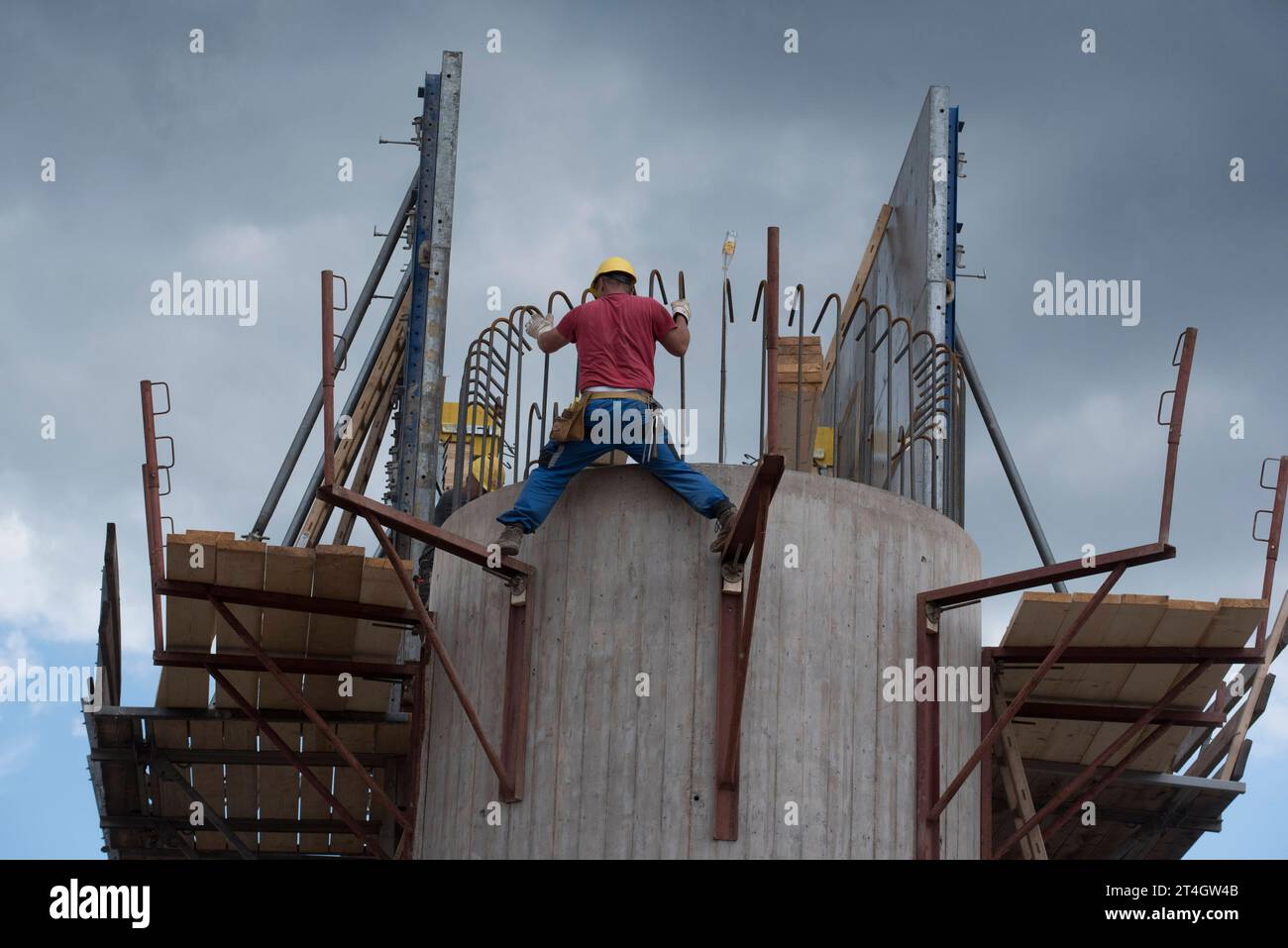 construction worker at a building site, employee in construction ...