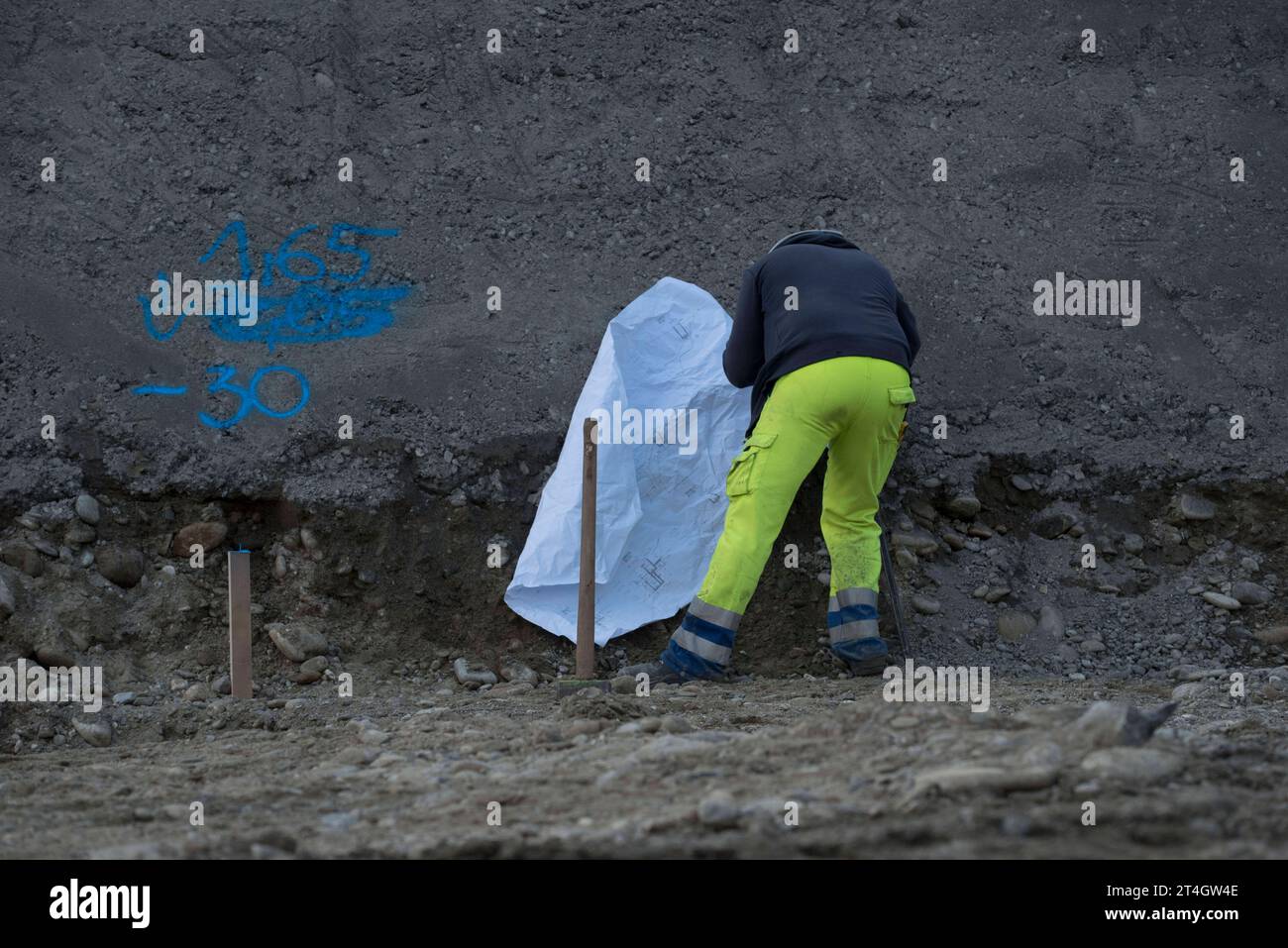 construction worker at a building site, employee in construction ...