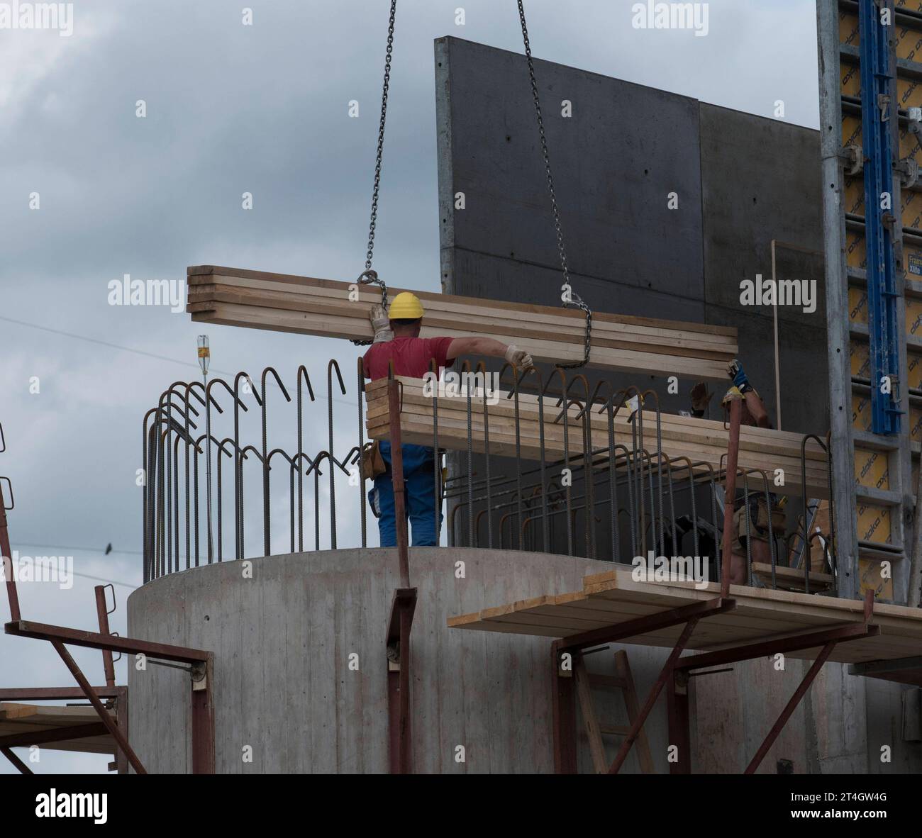 construction worker at a building site, employee in construction ...
