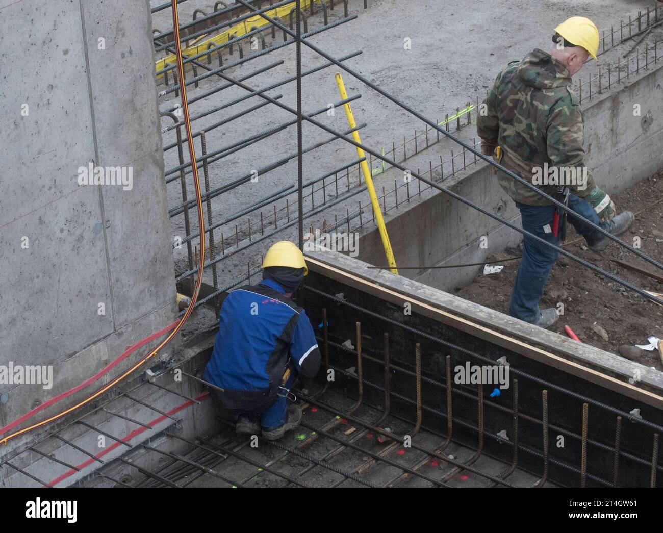 construction worker at a building site, employee in construction ...