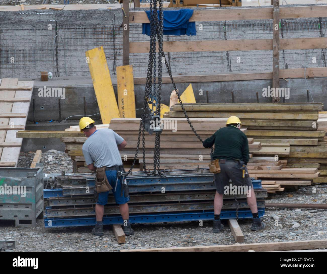 construction worker at a building site, employee in construction ...