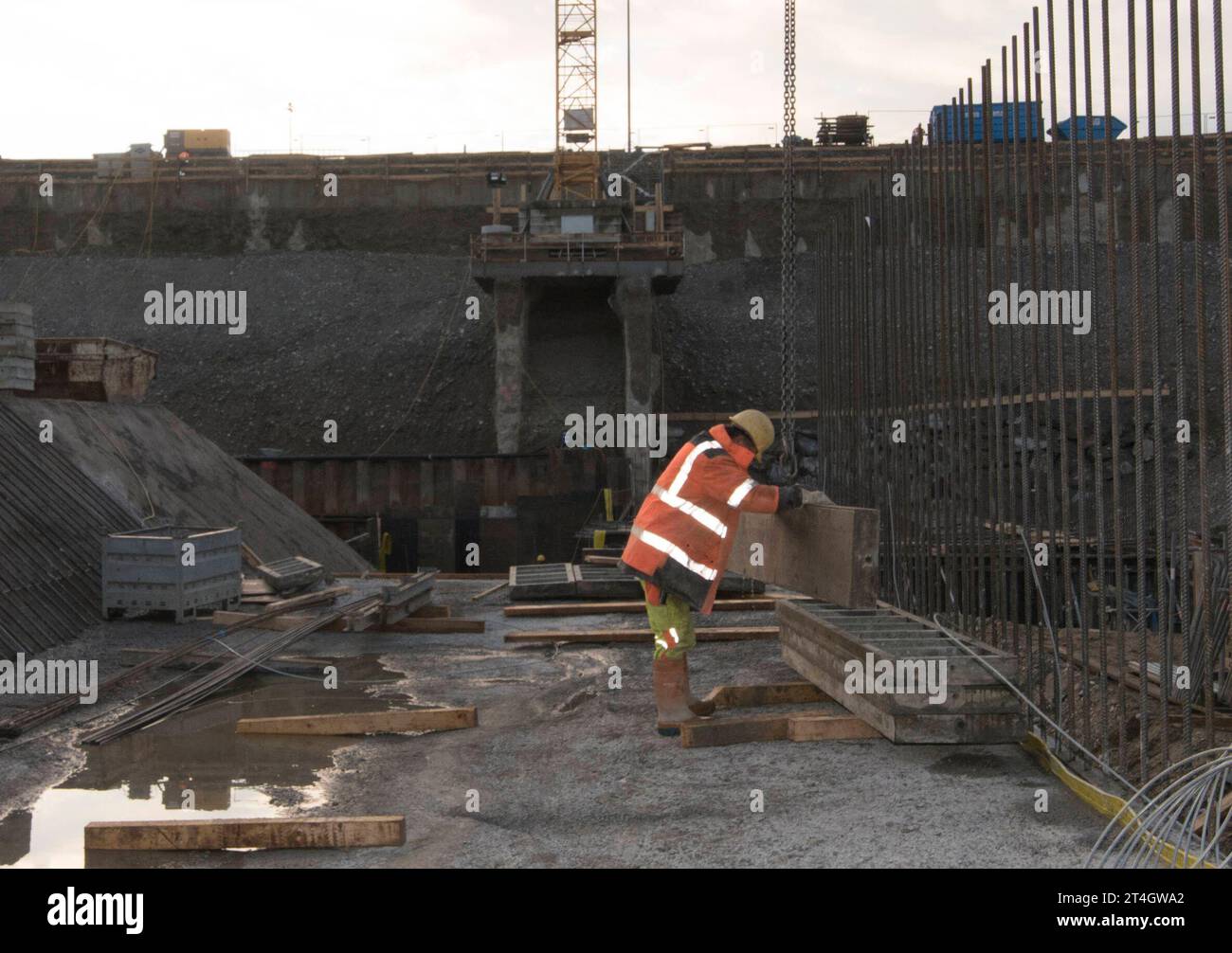 Construction Worker At A Building Site, Employee In Construction ...