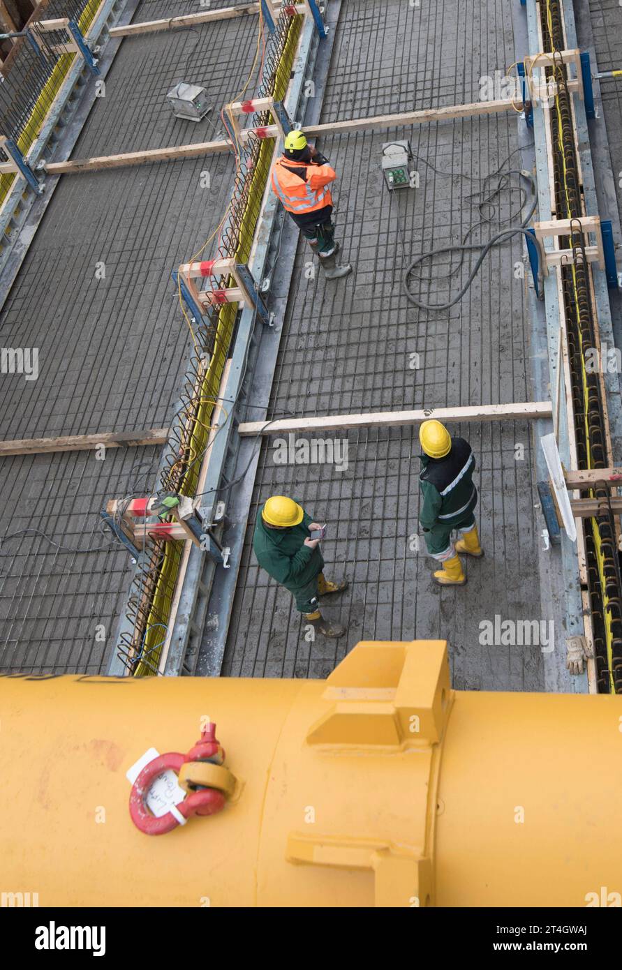 Construction Worker At A Building Site, Employee In Construction ...