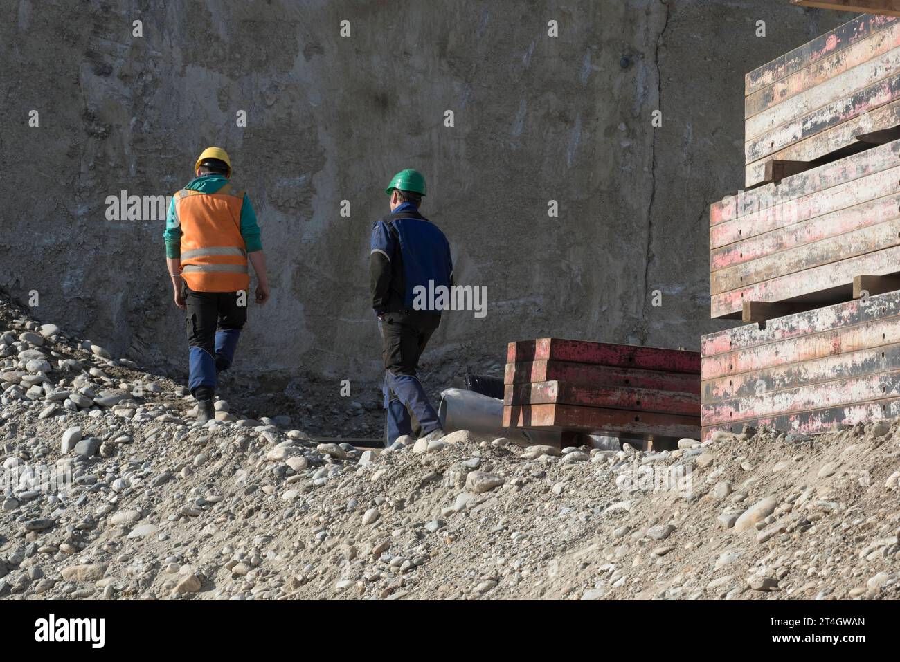 Construction Worker At A Building Site, Employee In Construction ...