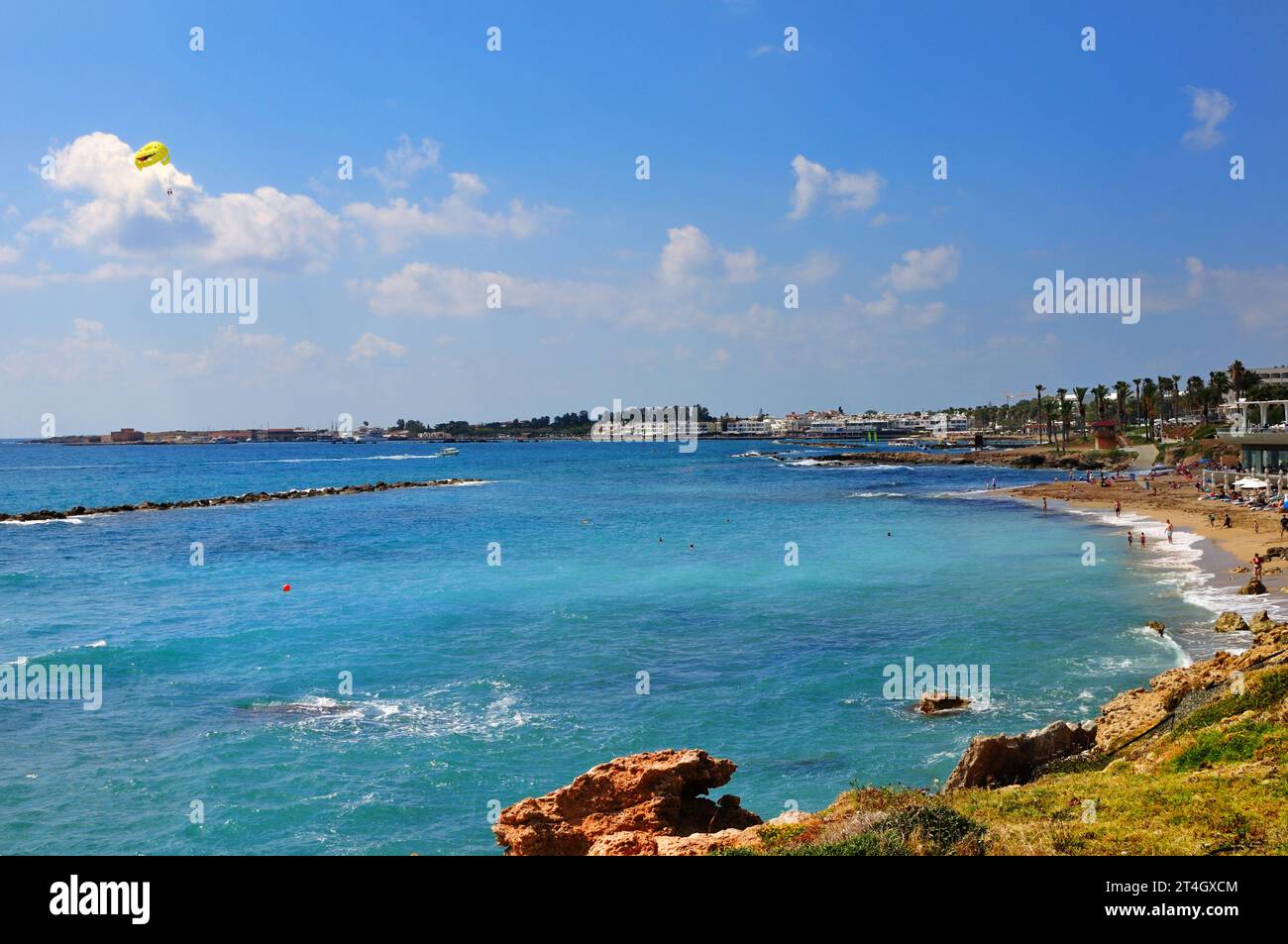 Tourists enjoying the sea in a beautiful beach in Paphos Stock Photo ...