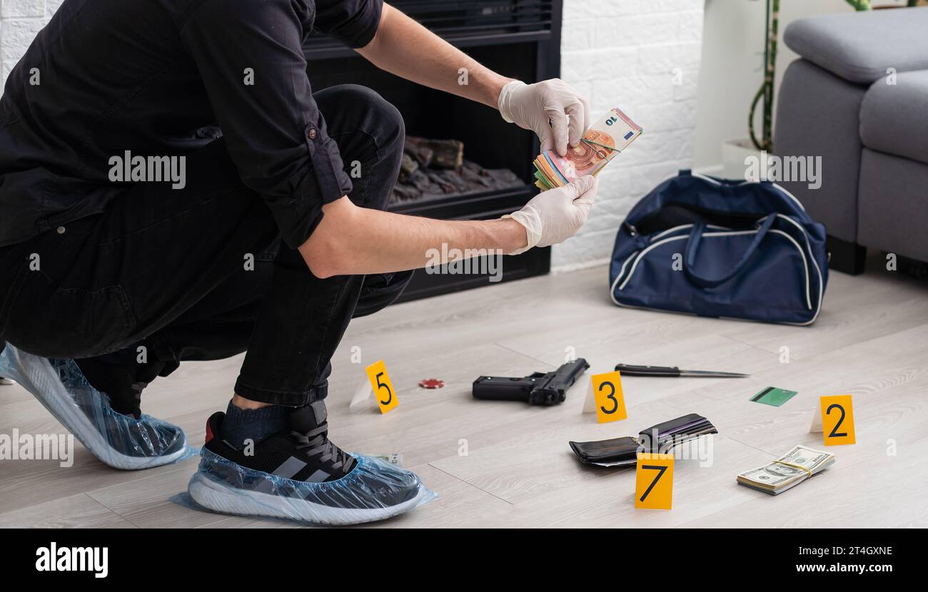Detective Collecting Evidence In A Crime Scene Forensic Specialists