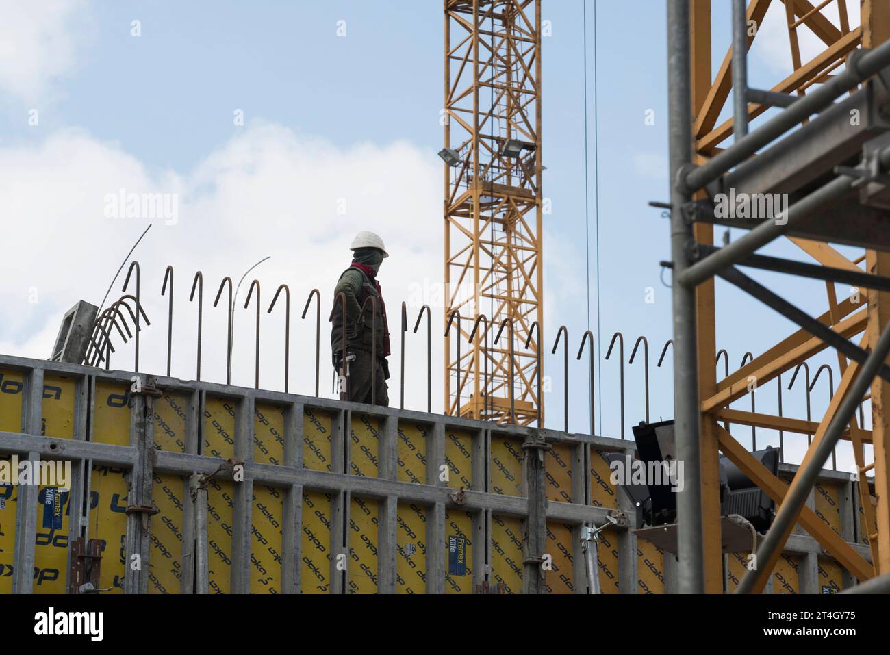 Construction Worker At A Building Site, Employee In Construction ...