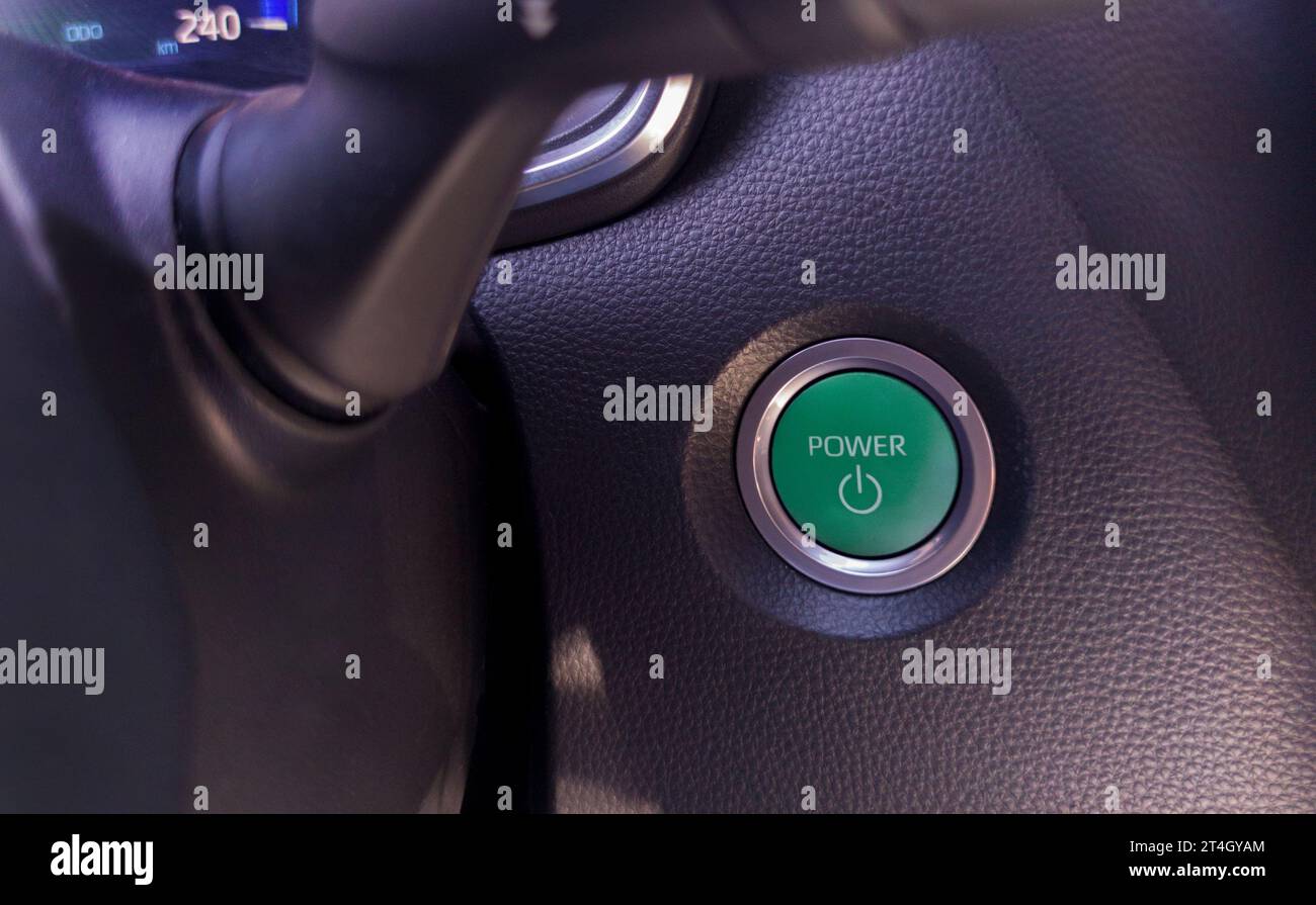 Start button of a hybrid or electric car. Eco driving concept Stock ...