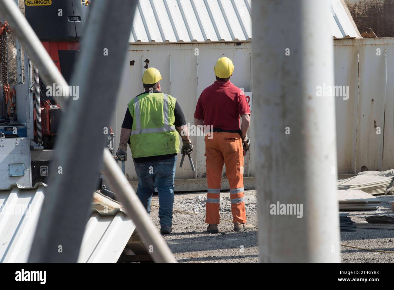 Construction Worker At A Building Site, Employee In Construction ...