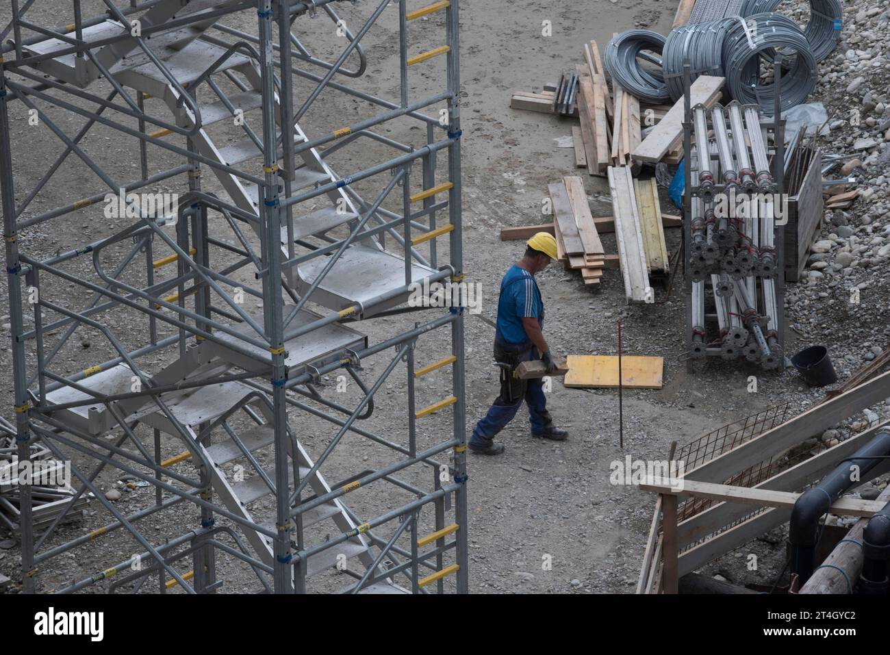 Construction Worker At A Building Site, Employee In Construction ...