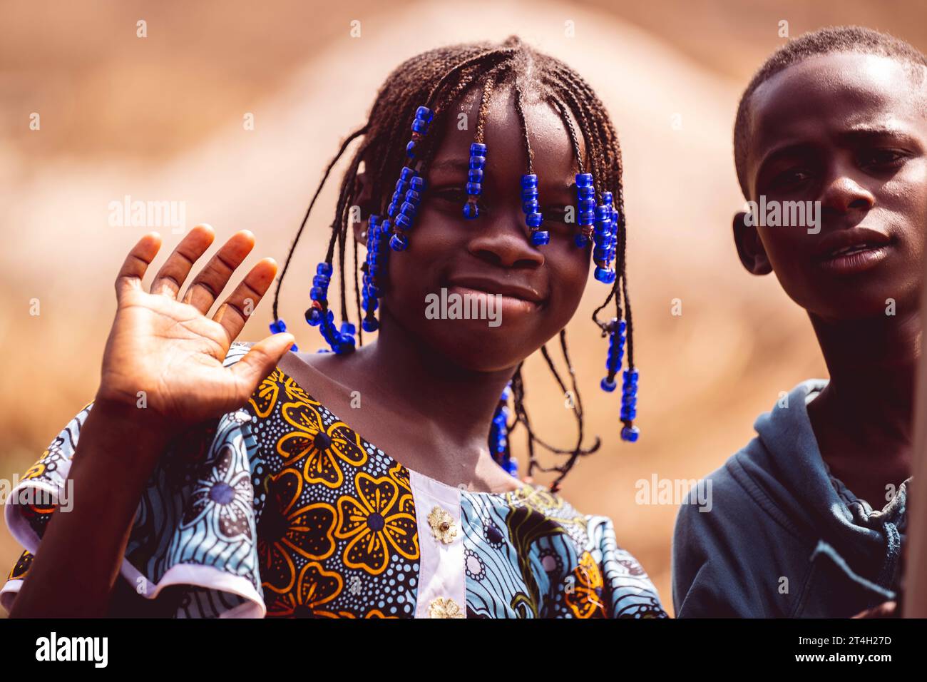 The happy children smiling at the camera in Abidjan, Cote d'Ivoire ...