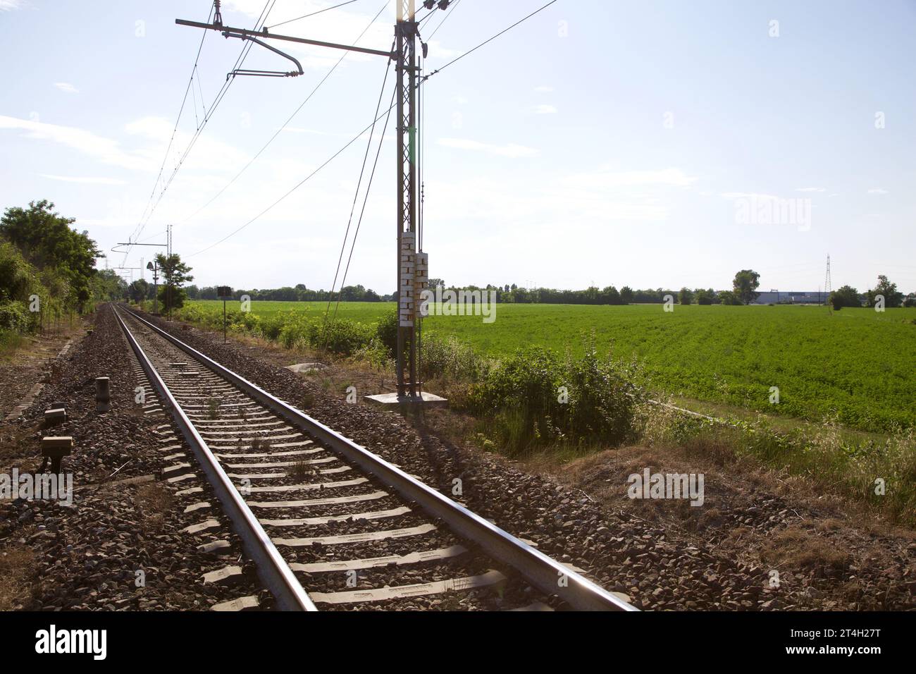Railroad track in the italian countryside Stock Photo - Alamy
