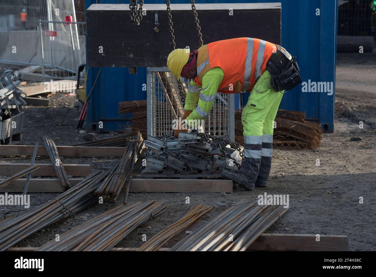 Construction Worker At A Building Site, Employee In Construction ...