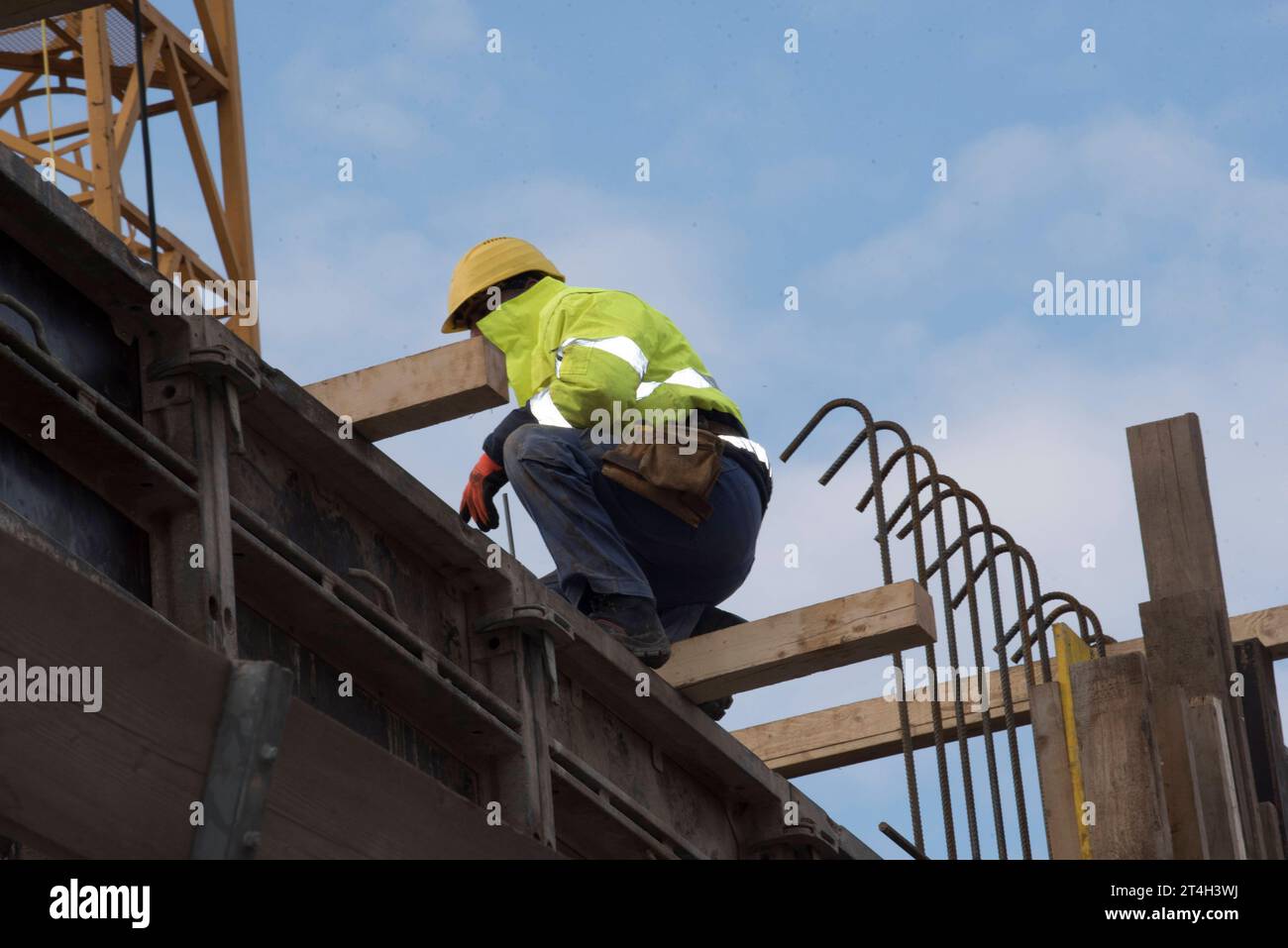 Construction Worker At A Building Site, Employee In Construction ...