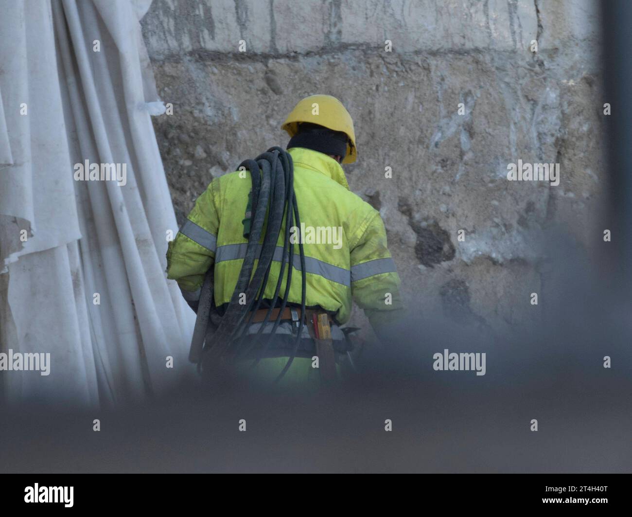 Construction Worker At A Building Site, Employee In Construction ...